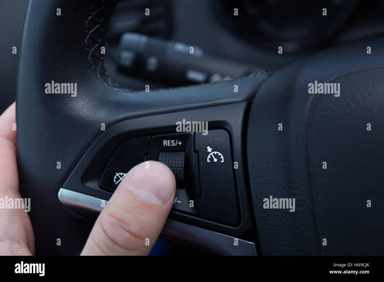 speed limitation and cruise control buttons on a steering wheel in ...