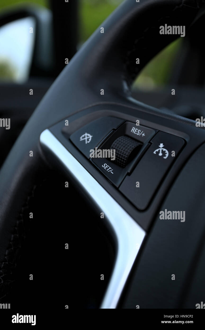 speed limitation and cruise control buttons on a steering wheel in ...