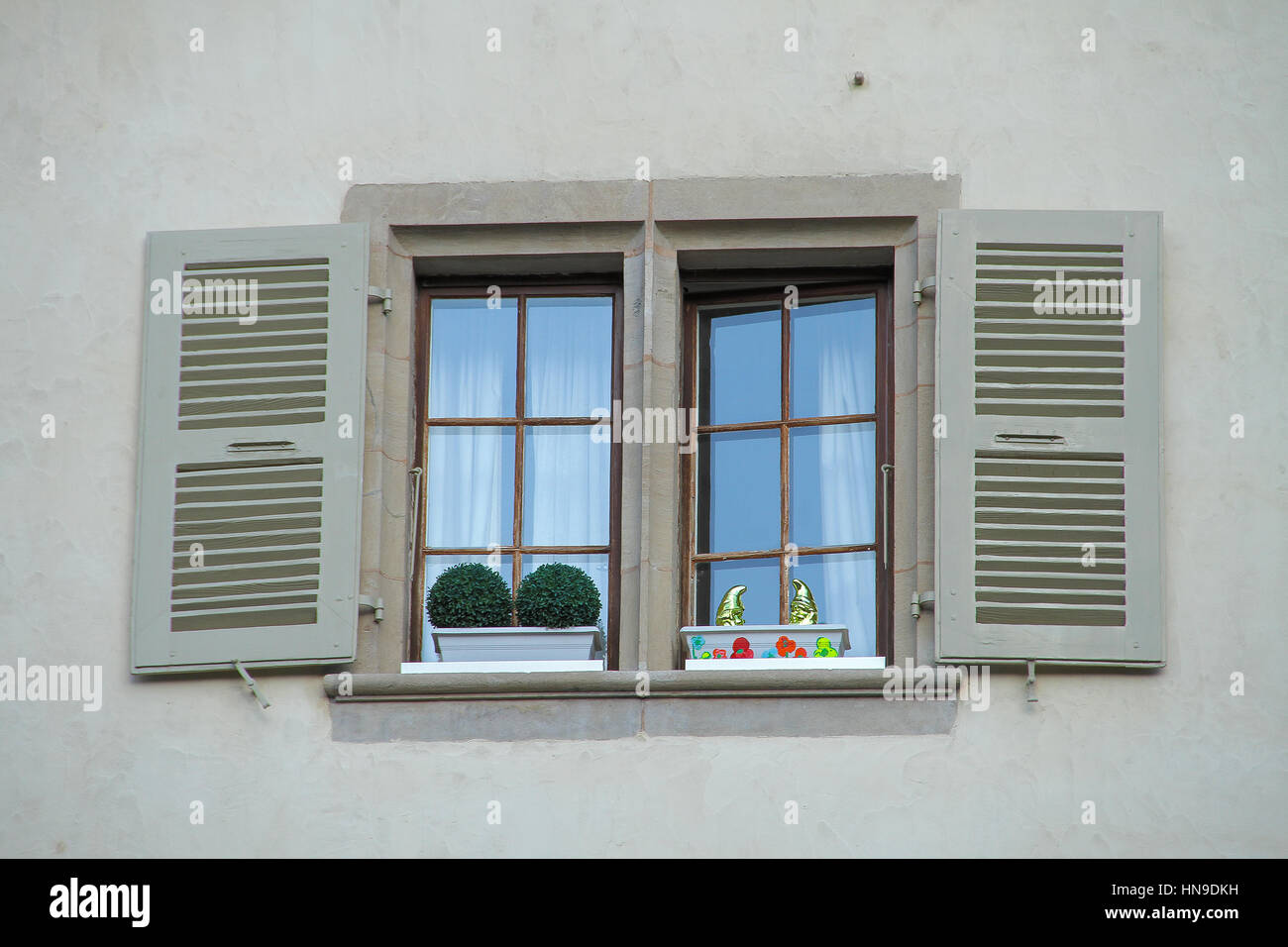 A cute window on the old street Stock Photo - Alamy