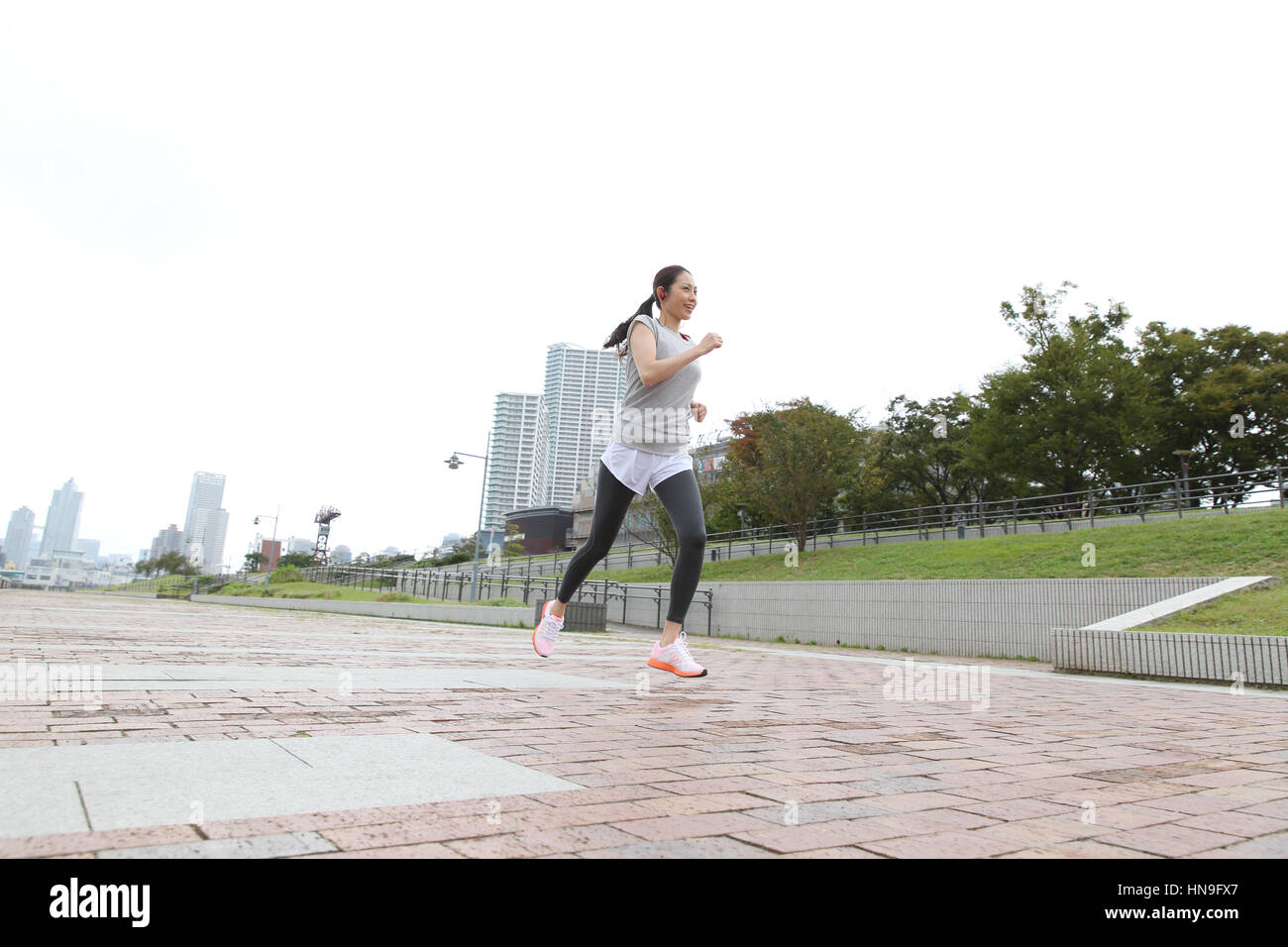 Attractive woman running hi-res stock photography and images - Alamy