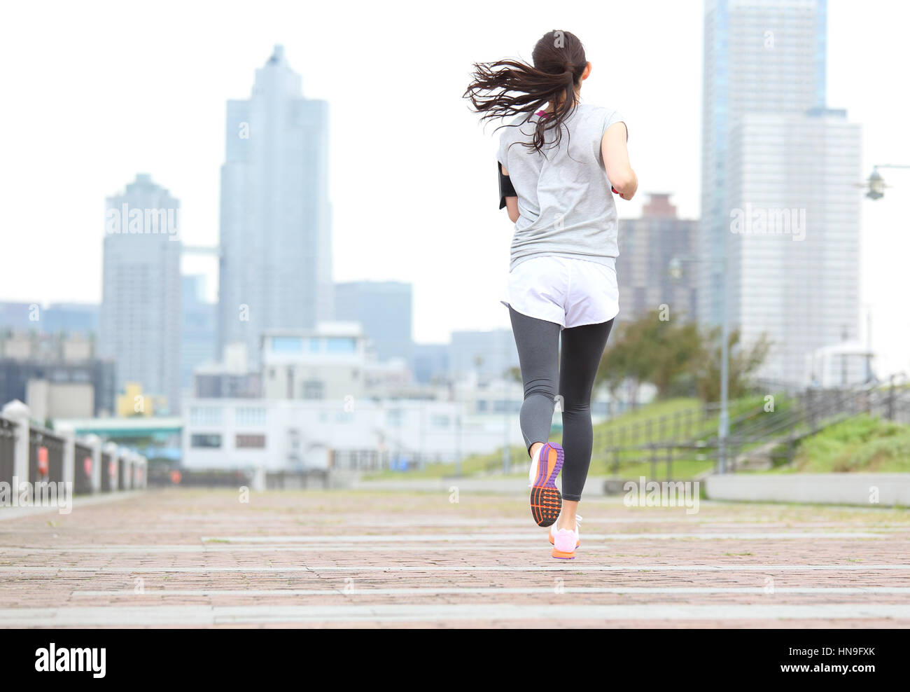Attractive woman running hi-res stock photography and images - Alamy
