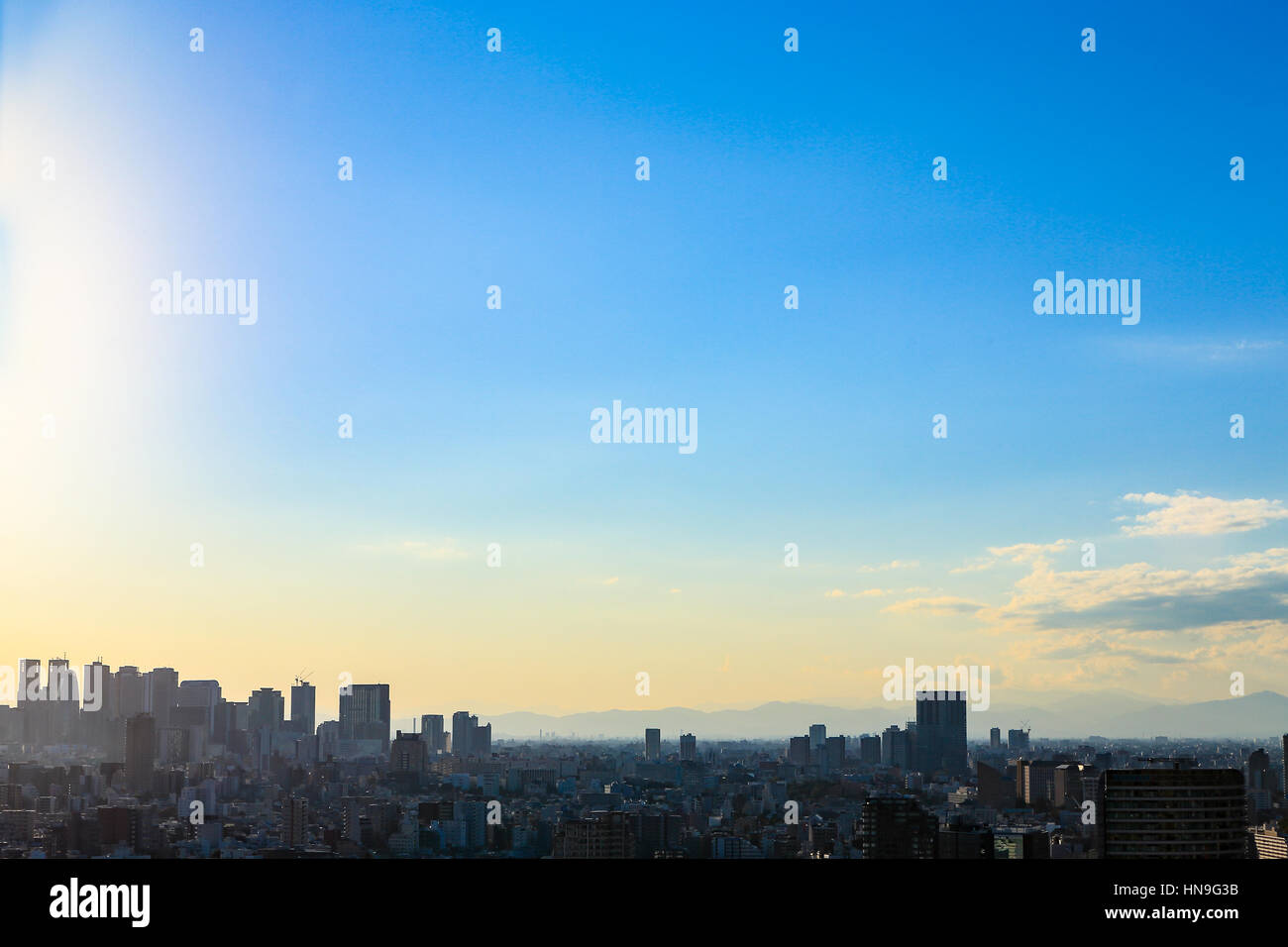 Tokyo cityscape and blue sky, Tokyo, Japan Stock Photo - Alamy