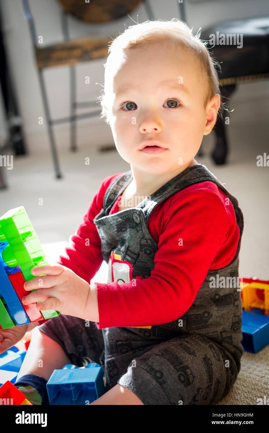 Baby boy playing bricks hi-res stock photography and images - Alamy