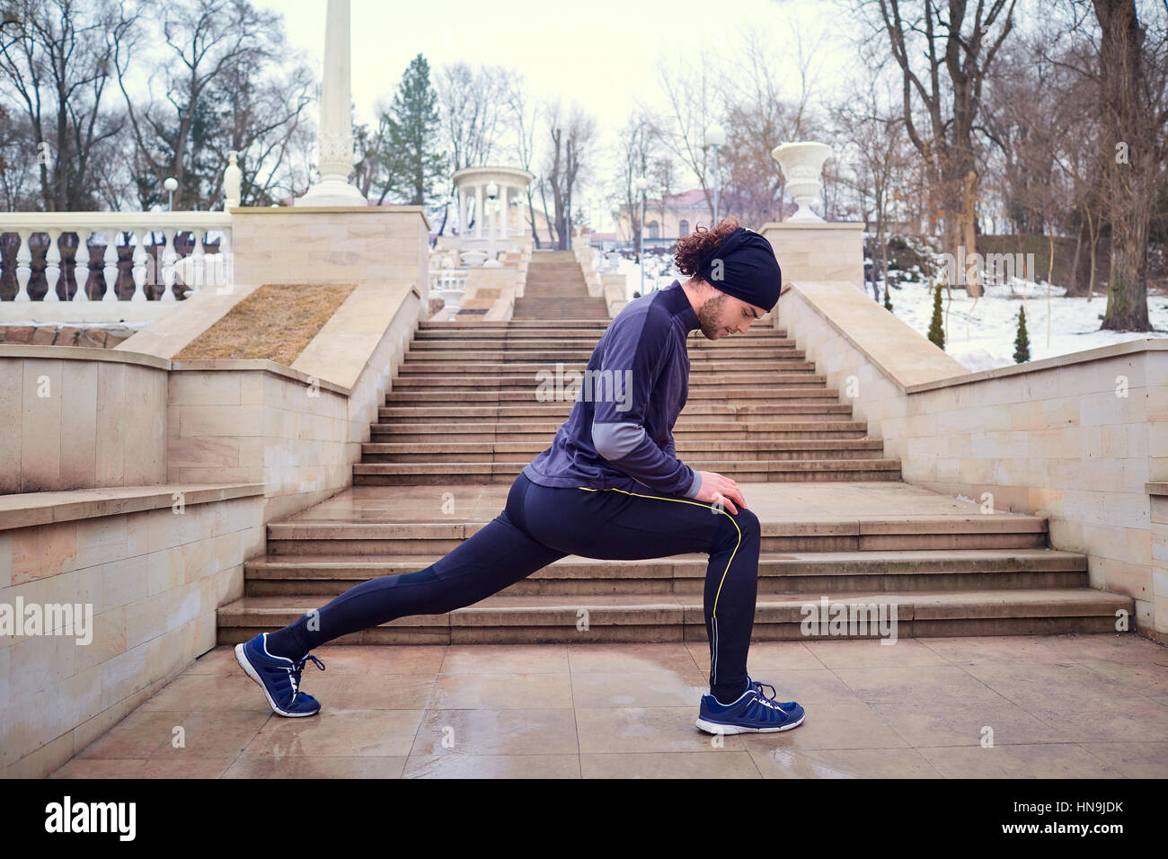 Athlete man warming up before running. Sport life Stock Photo - Alamy