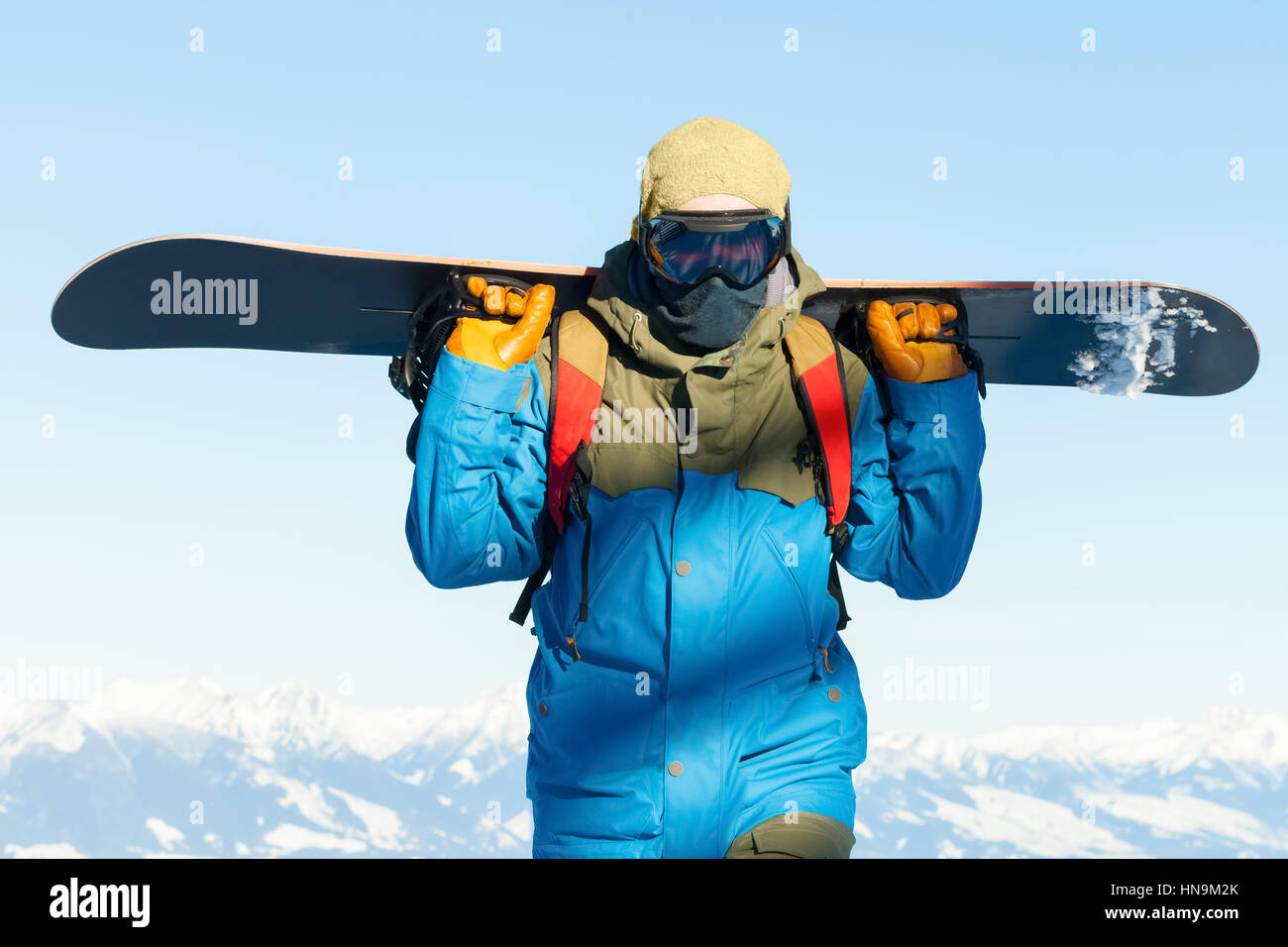 Back view young snowboarder hi-res stock photography and images - Alamy