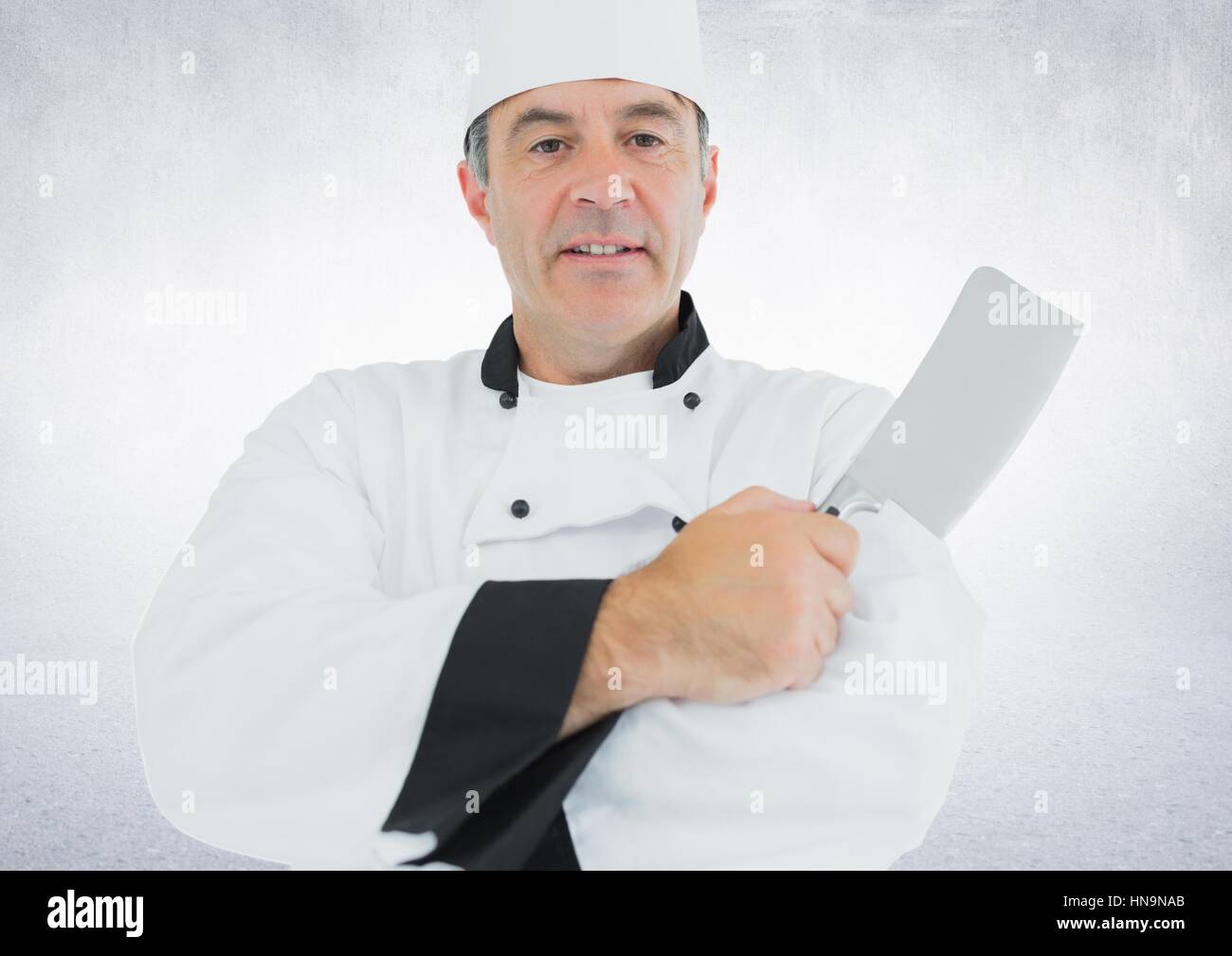 Digital composite of Chef with knife against white background Stock ...