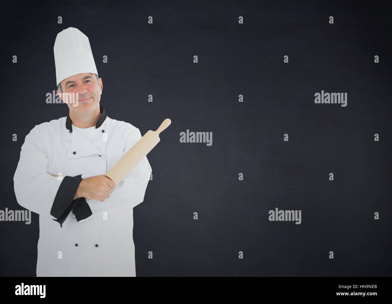 Digital composite of Chef with rolling pin against navy background ...