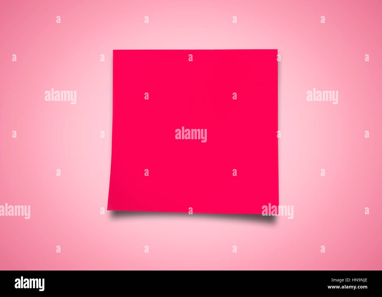 Digital composite of Red sticky Note against neutral pink background ...
