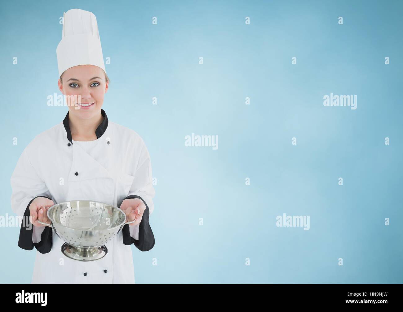 Digital composite of Chef with sieve against blue background Stock ...
