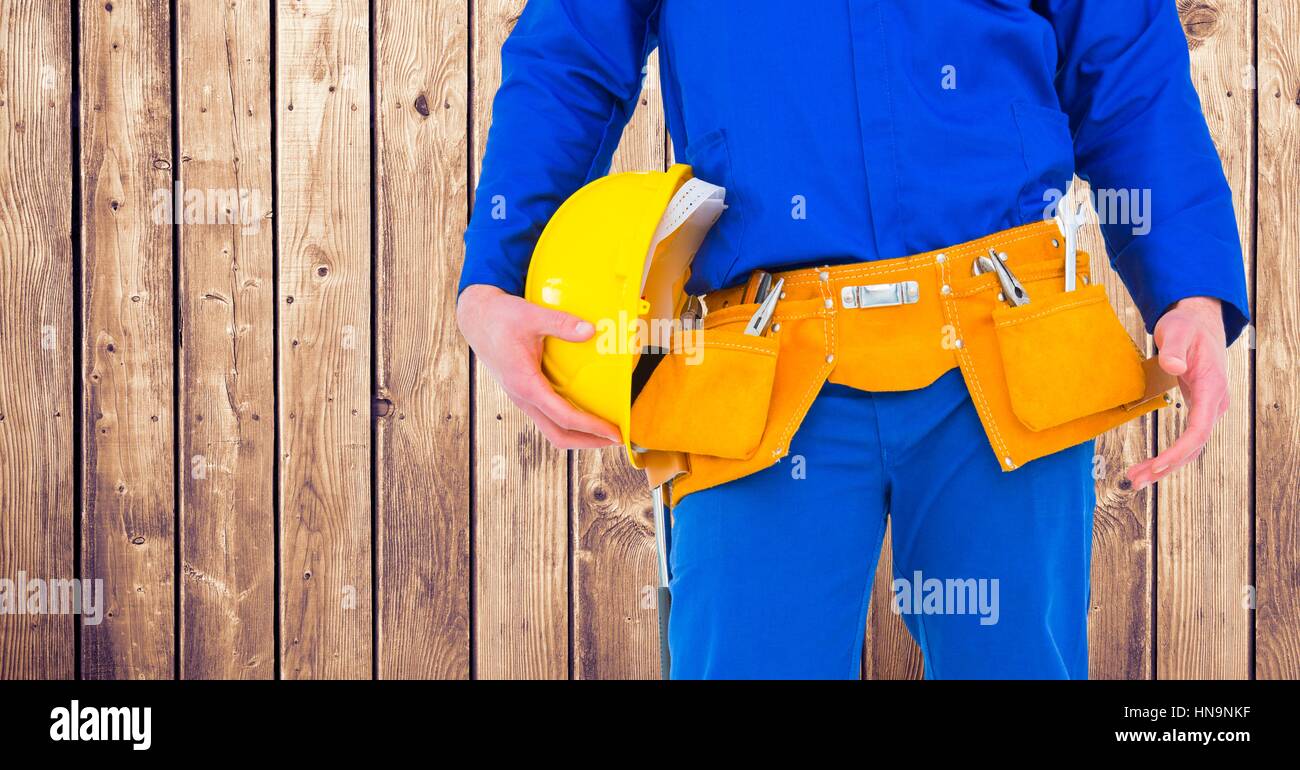 Digital composite of Carpenter against wood panel Stock Photo - Alamy
