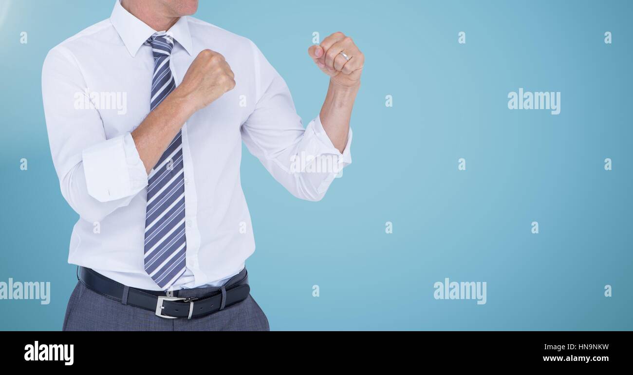 Digital composite of Businessman Torso with combative posture against ...