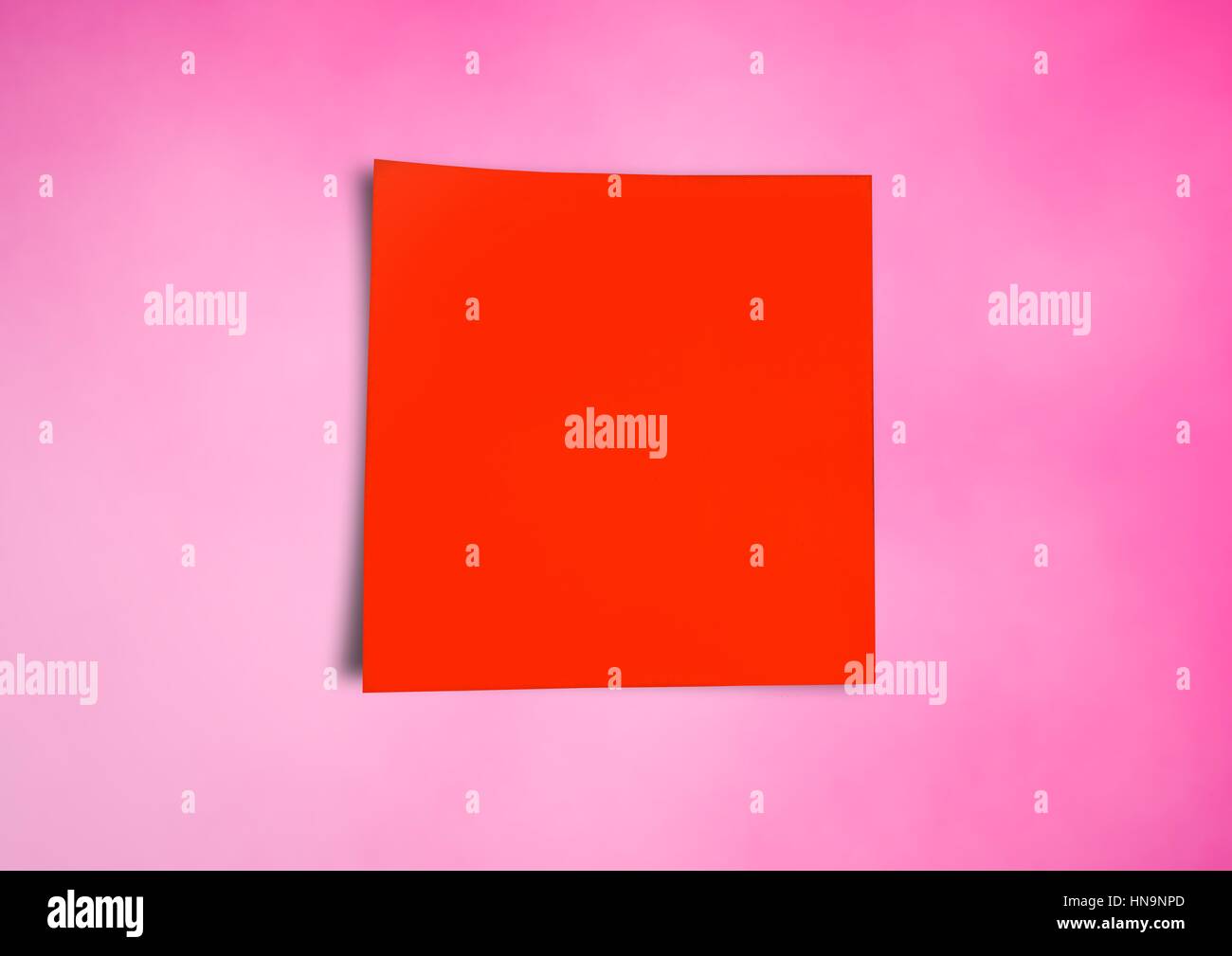 Digital composite of red Sticky Note against pink background Stock ...