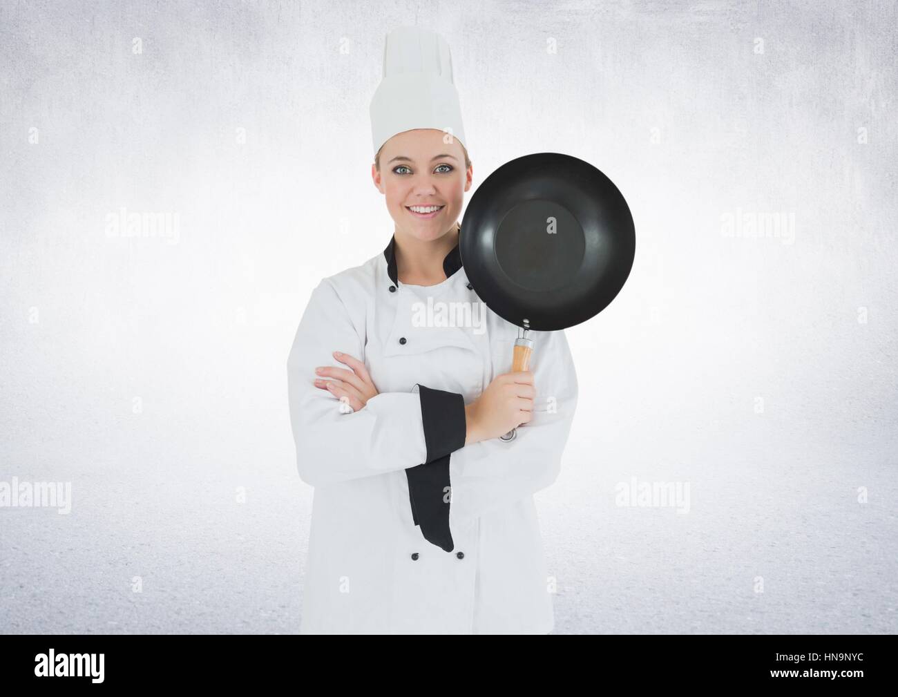 Digital composite of Chef with frying pan against white background ...