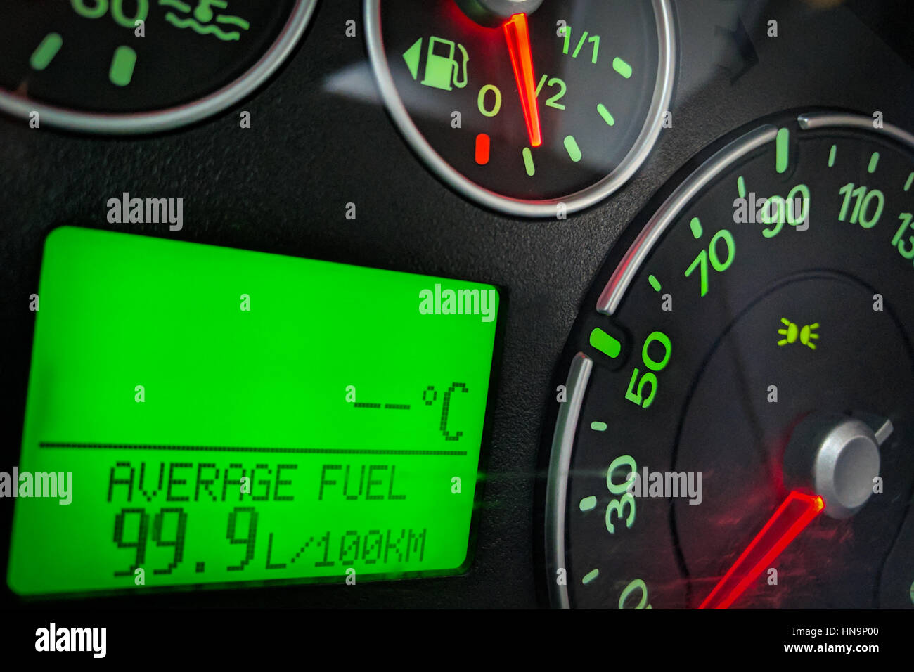Close up image of a car's dashboard indicating a very high fuel ...