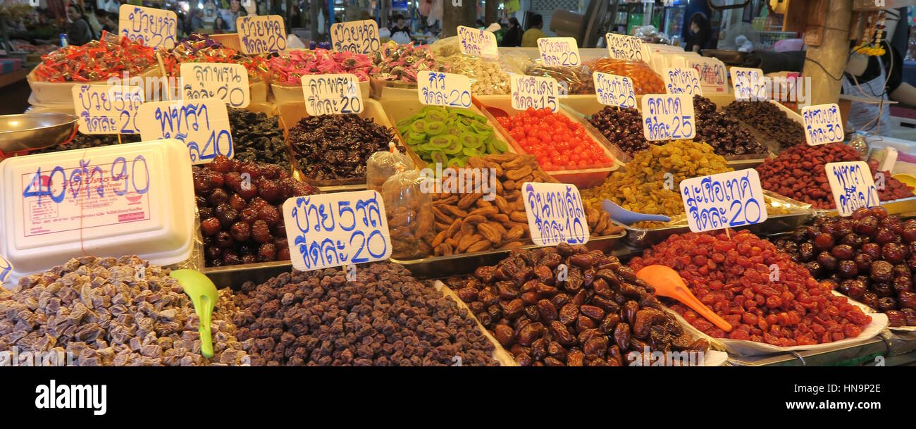 Dried food and candies at a local market in Thailand Stock Photo - Alamy