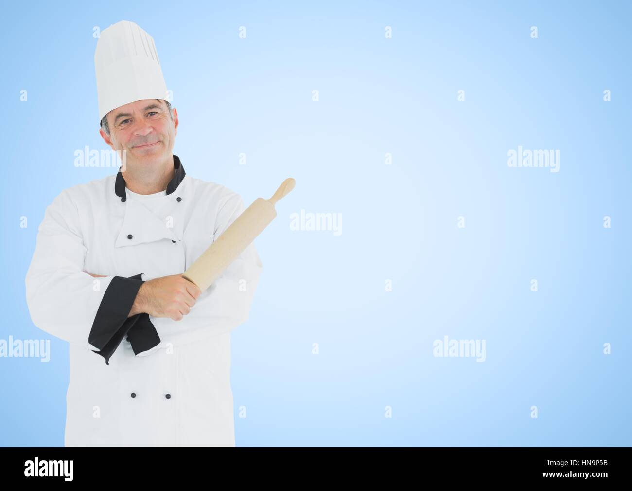 Digital composite of Chef with rolling pin against blue background ...