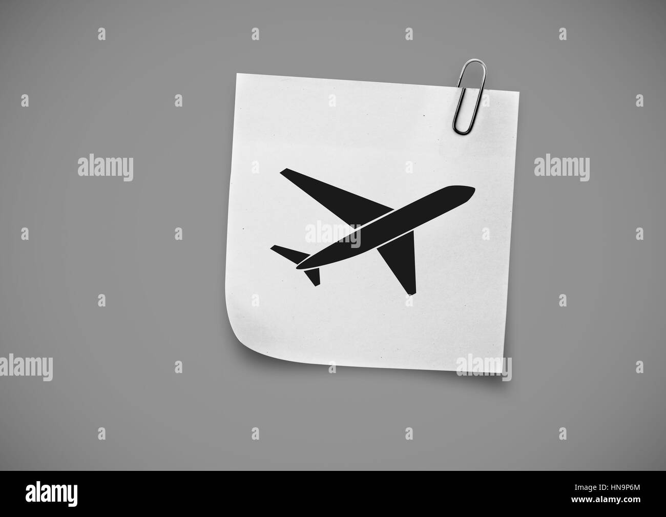 Digital composite of Sticky Note Plane icon against grey background ...