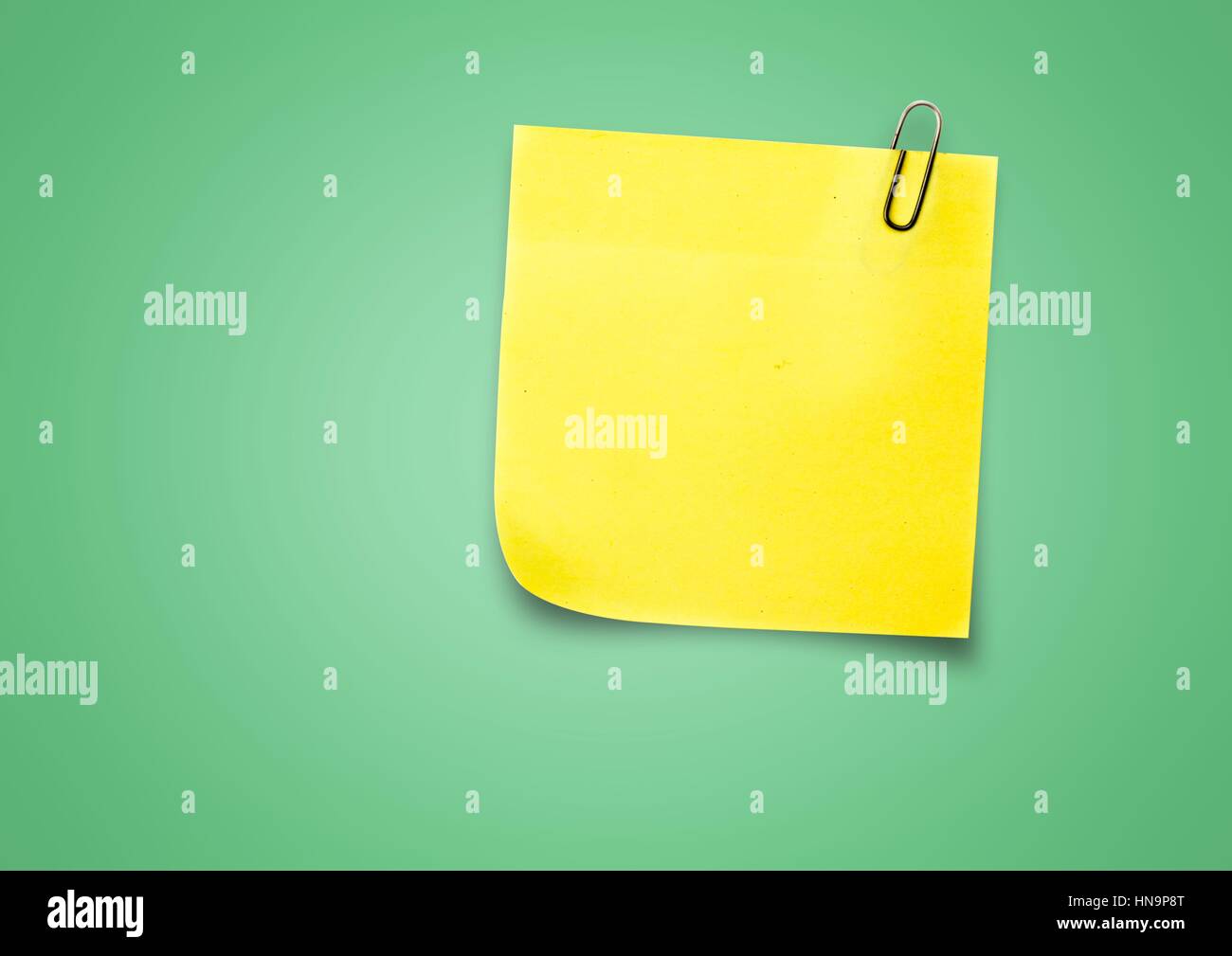 Digital composite of Yellow Sticky Note against a neutral green ...