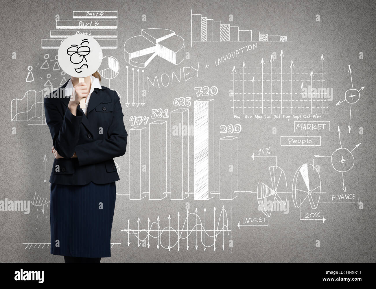 Businesswoman hiding her face behind round mask Stock Photo - Alamy