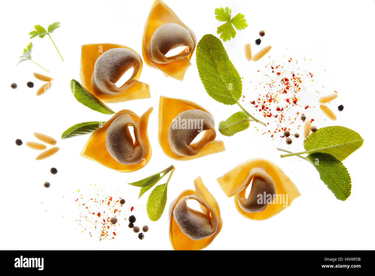 pattern from ravioli and seasonings. concept of italian cuisine Stock ...