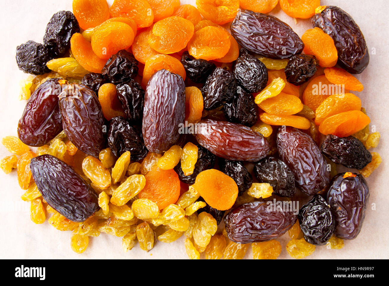 dried fruit isolated on white background. dates, raisins, dried ...
