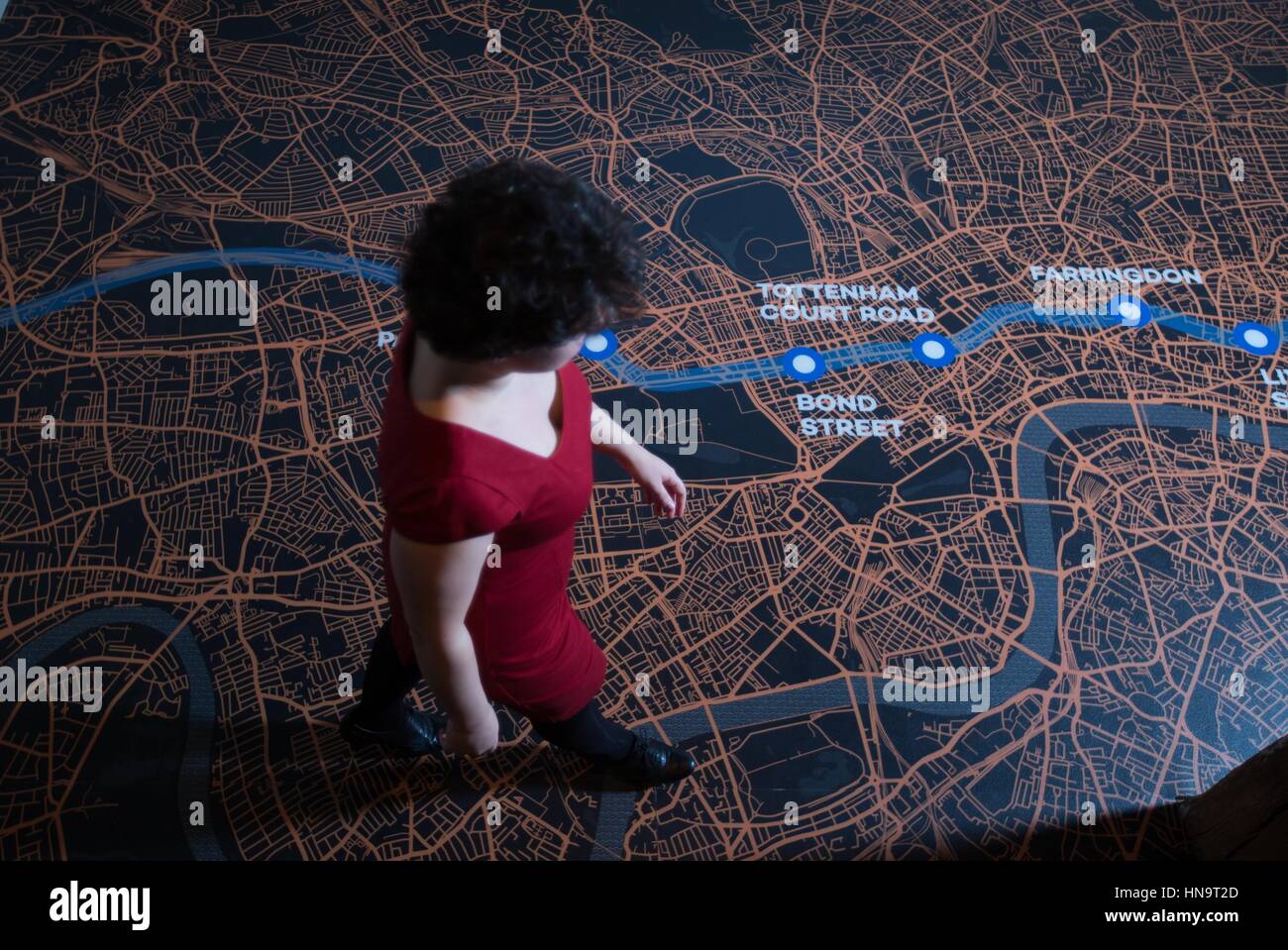 EDITORIAL USE ONLY A visitor walks the Elizabeth Line at at the launch ...