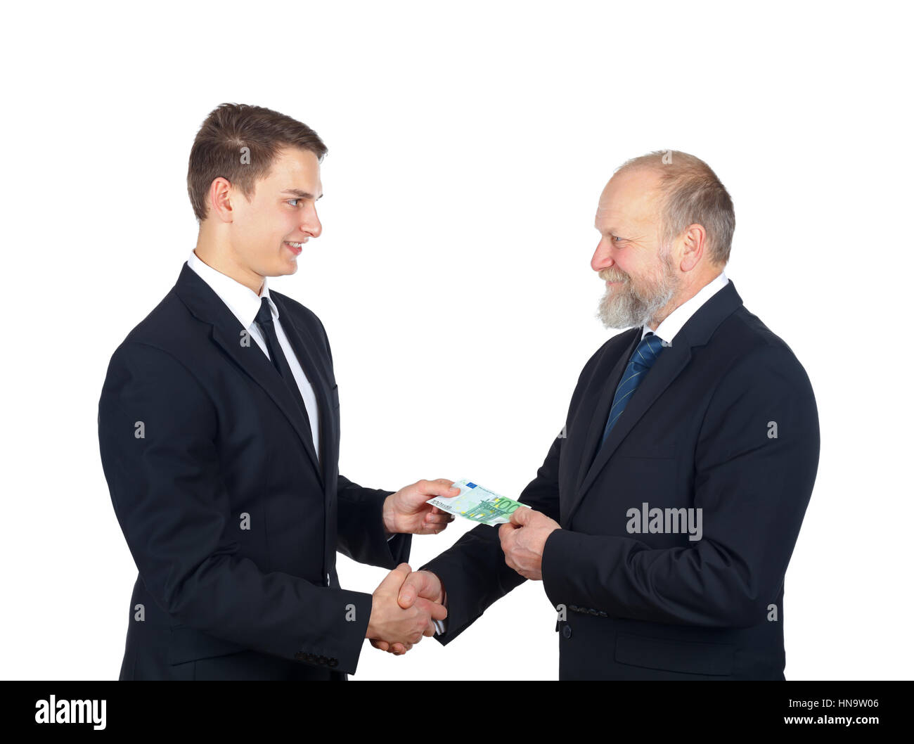Portrait of two confident businessman makeing a deal Stock Photo - Alamy