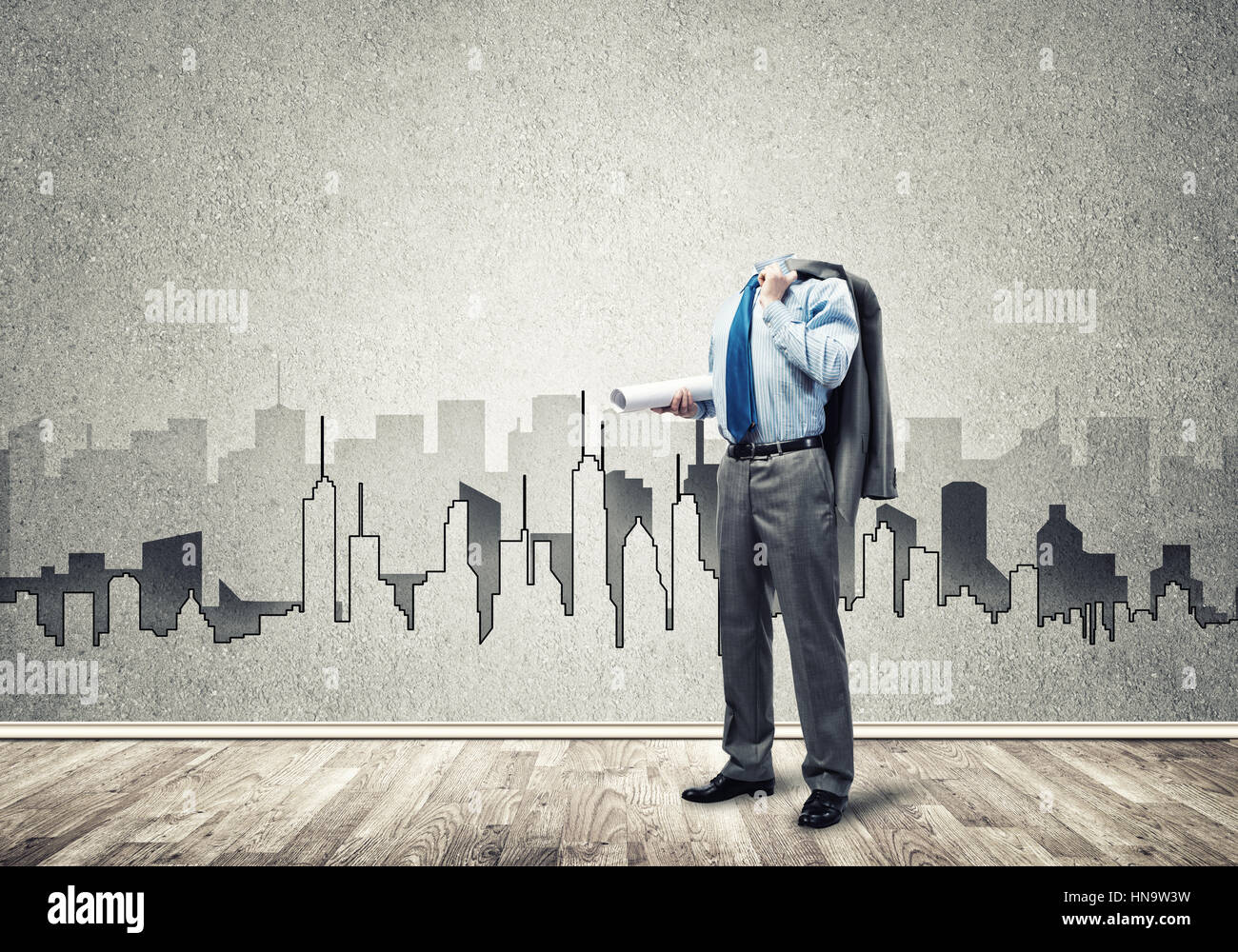 Headless engineer man with papers in hand against construction ...