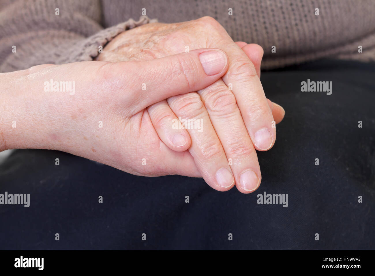 Senior old age pensioner hand carer hi-res stock photography and images ...
