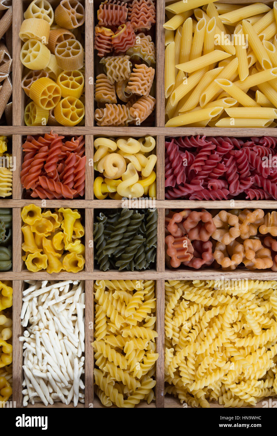 Variety of types, colors and shapes of Italian pasta. Dry pasta ...