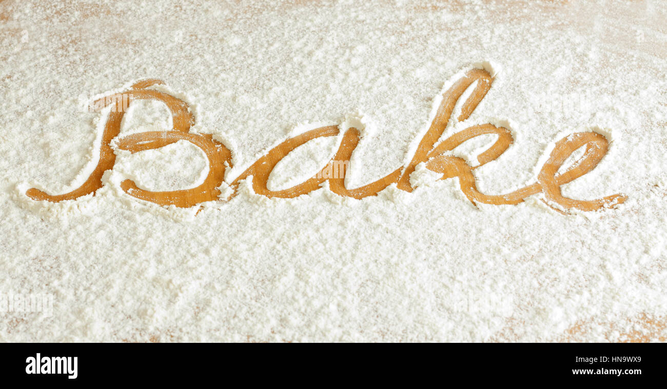 Close up of words written in flour Stock Photo - Alamy