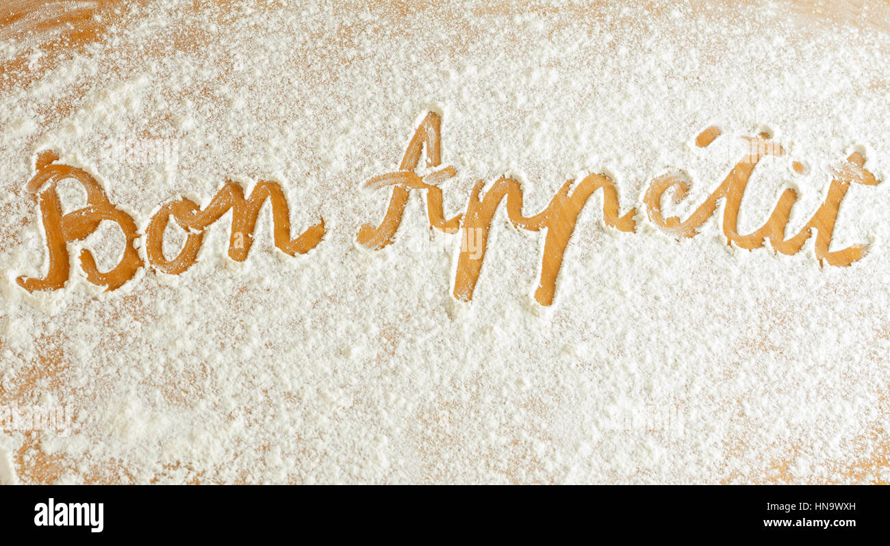 Close up of words written in flour Stock Photo - Alamy