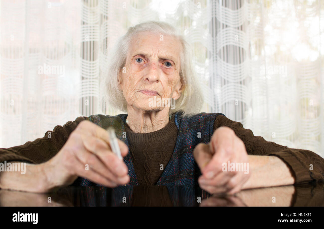 Adult smoking wrinkled face hi-res stock photography and images - Alamy