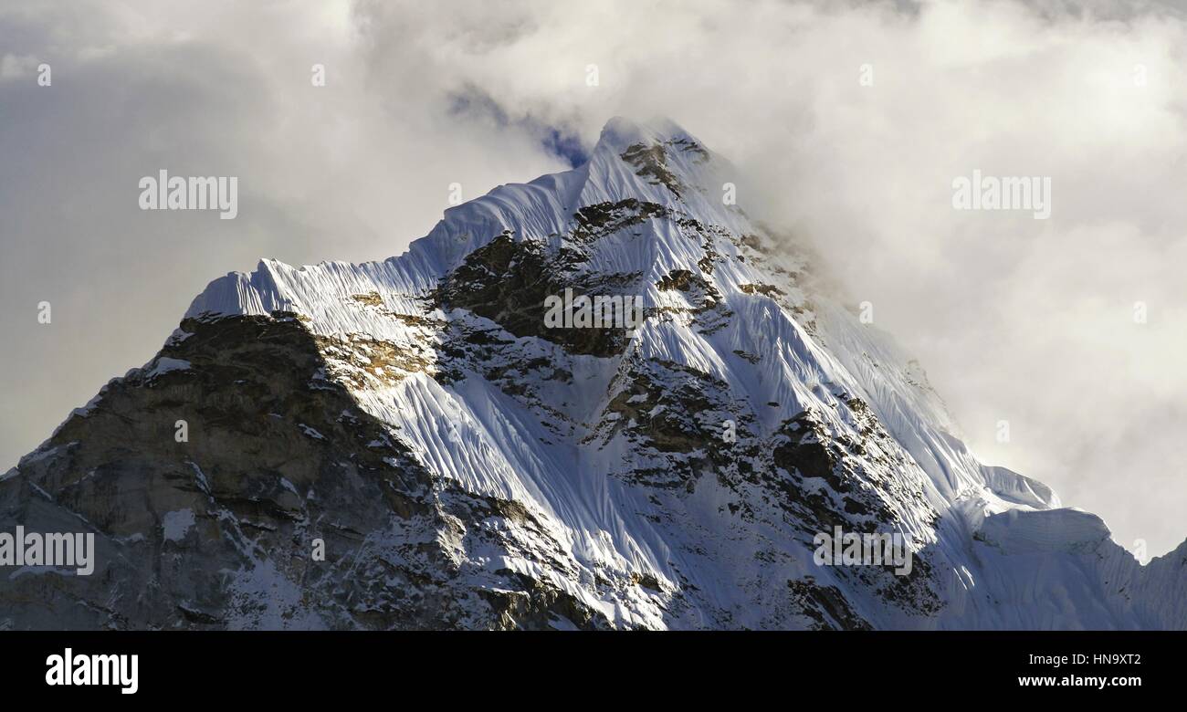 Snowy Cloud Covered Ama Dablam Mountain Peak. Misty Nepal Himalaya ...