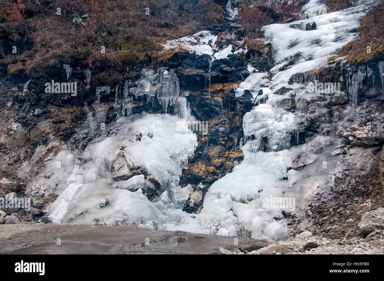 Frozen waterfall in the Jang Valley, below the Se La (Pass) near Tawang ...