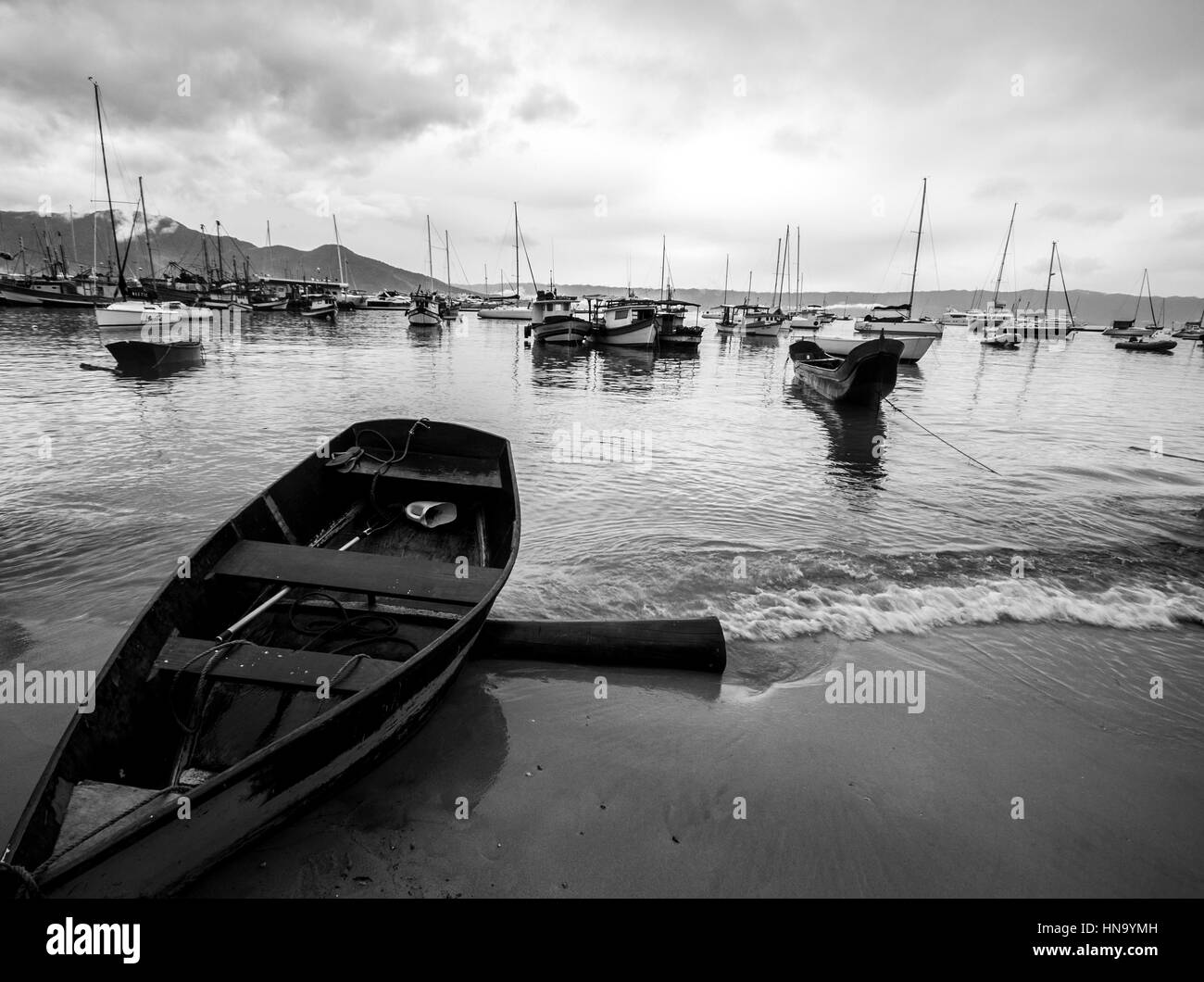 Moody scene boat on Black and White Stock Photos & Images - Alamy