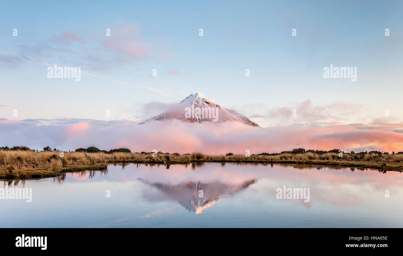 Reflection in Pouakai Tarn, stratovolcano Mount Taranaki or Mount ...