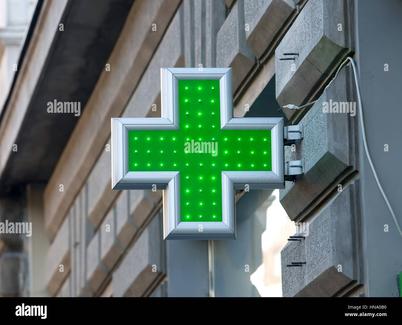 Green sign of the Red Cross as a designation for pharmacy Stock Photo ...
