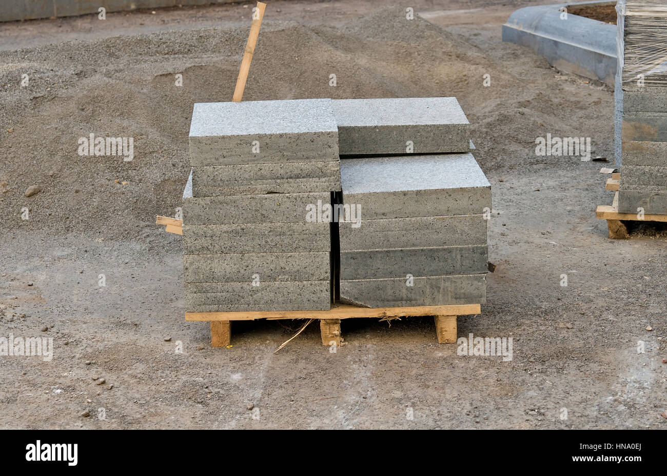 Bunch of marble slabs at the construction site of the future pavement ...