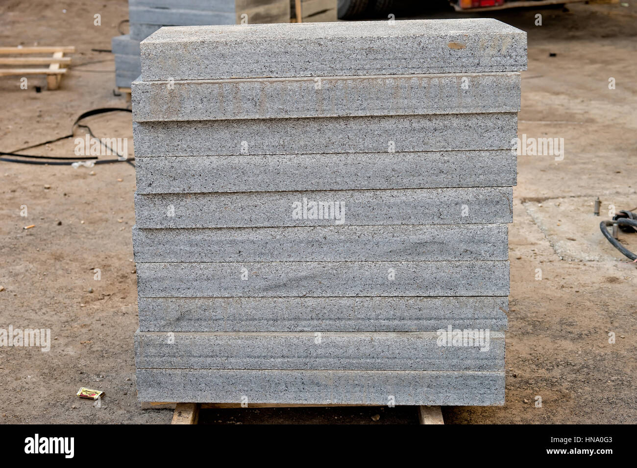 Bunch of marble slabs at the construction site of the future pavement ...