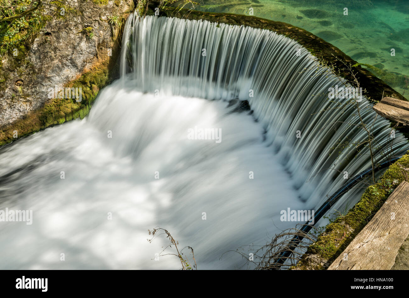 Semicircular dam with small lake that cause waterfall 01 Stock Photo ...