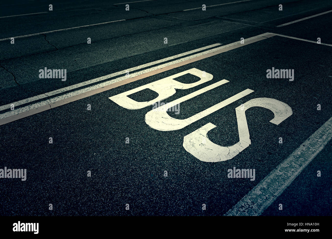 Yellow bus stop sign painted hi-res stock photography and images - Alamy