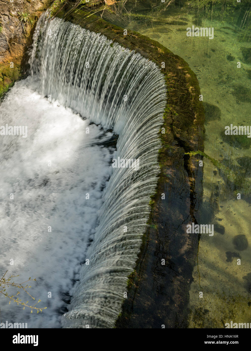 Semicircular dam with small lake that cause waterfall 01 Stock Photo ...
