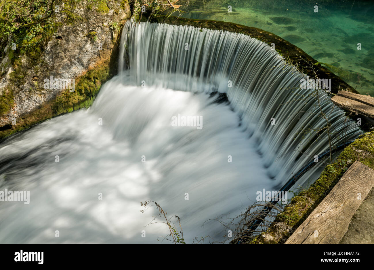 Semicircular dam with small lake that cause waterfall 01 Stock Photo ...