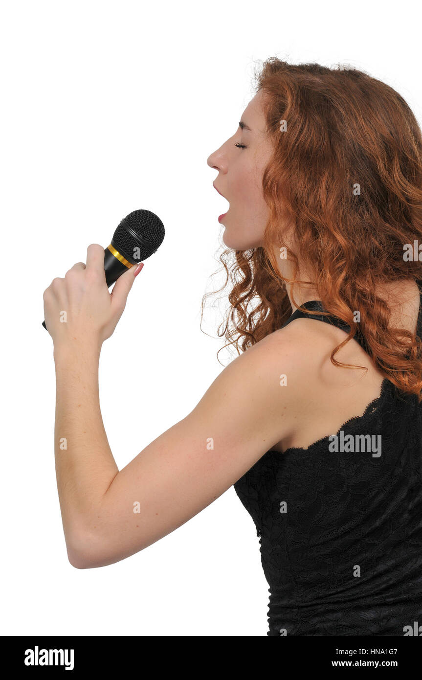 Beautiful woman singer performing at a concert Stock Photo - Alamy