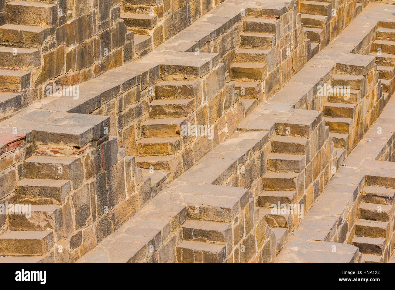 The steps of the Chand Baori Stepwell in Abhaneri, Rajasthan, India ...