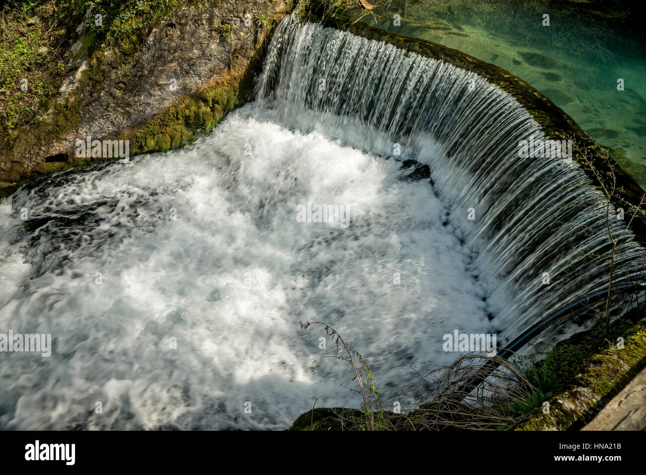 Semicircular dam with small lake that cause waterfall 01 Stock Photo ...