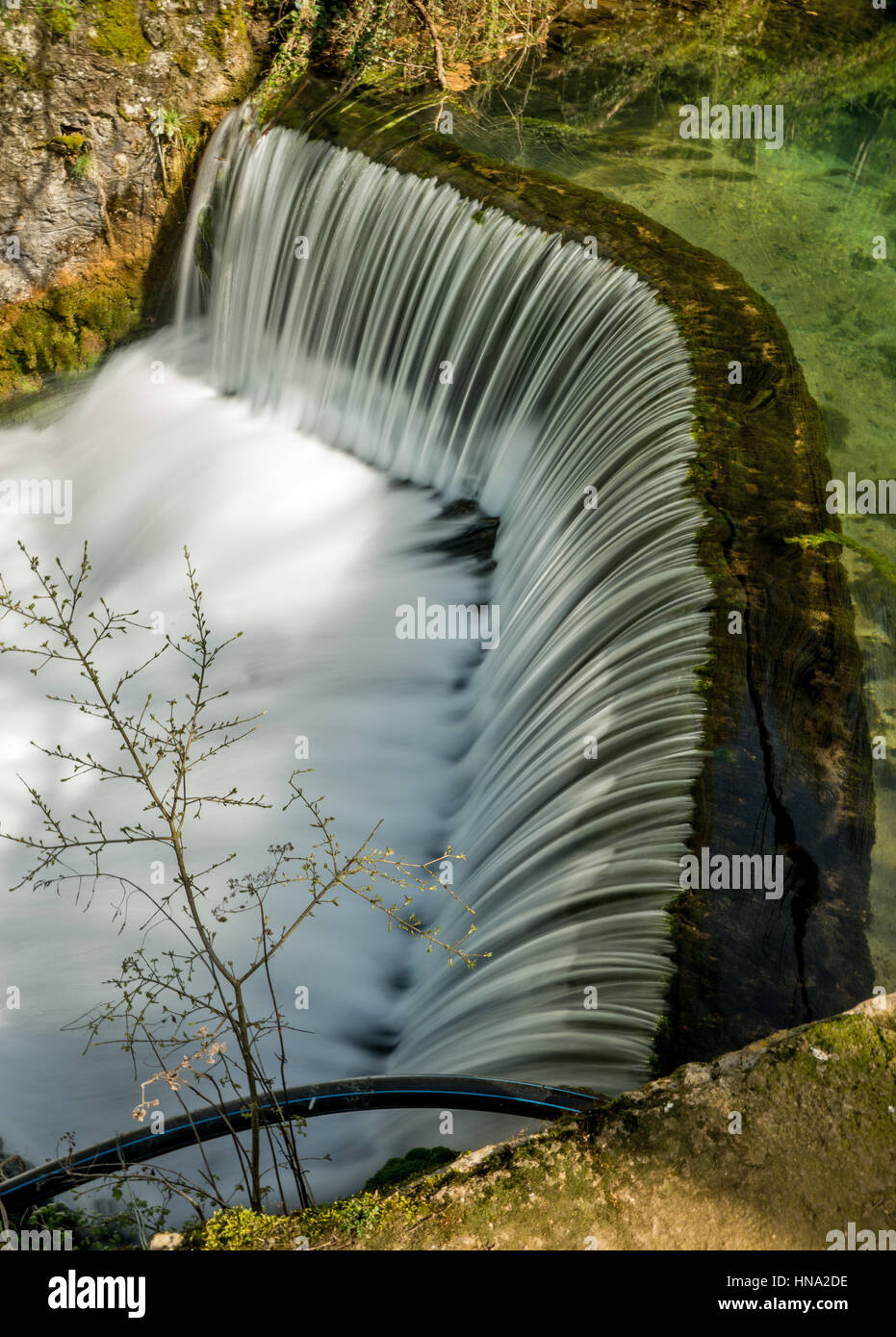 Semicircular dam with small lake that cause waterfall 01 Stock Photo ...