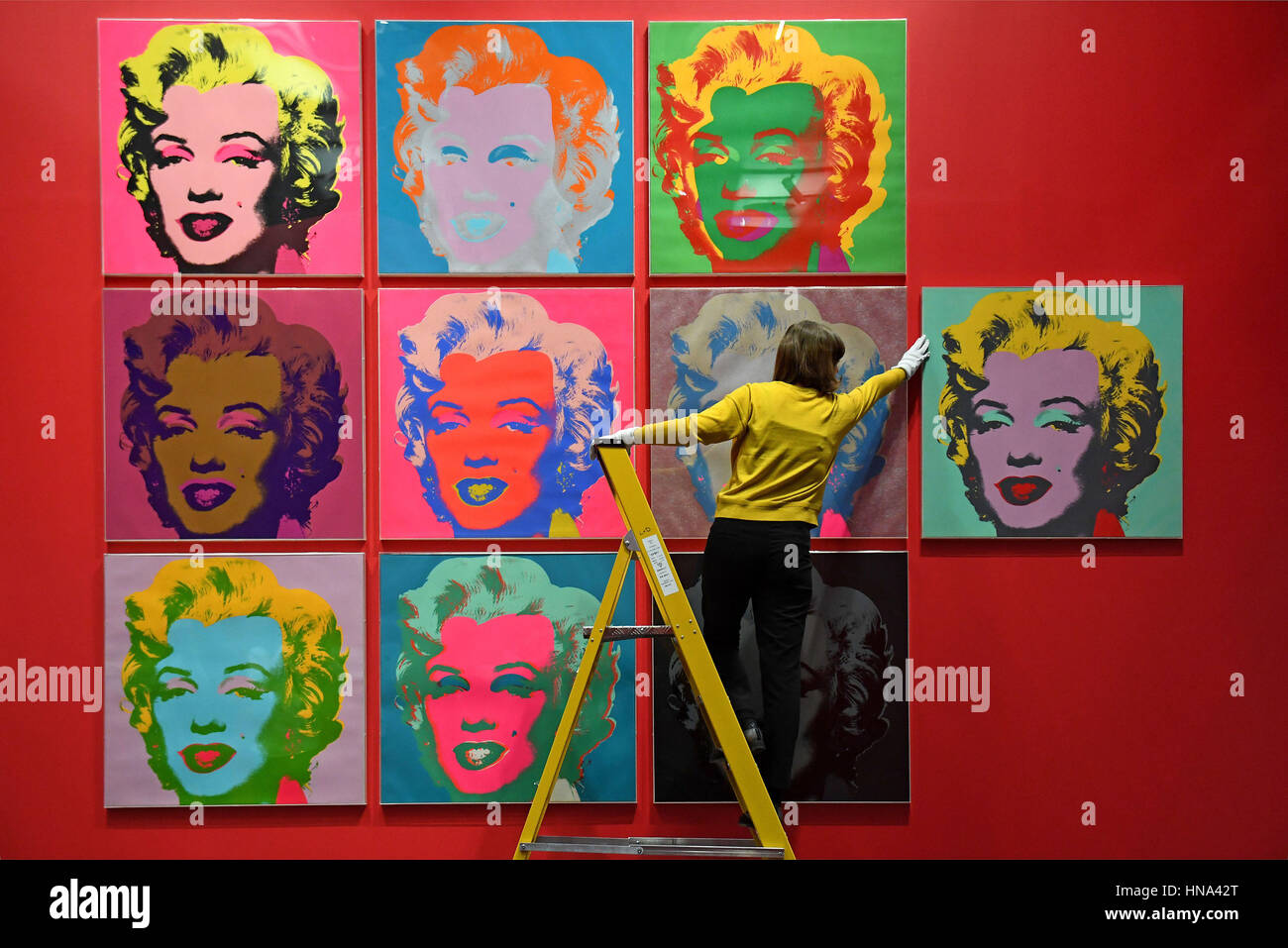 Catherine Daunt, project curator at the British Museum, adjusts one of ...