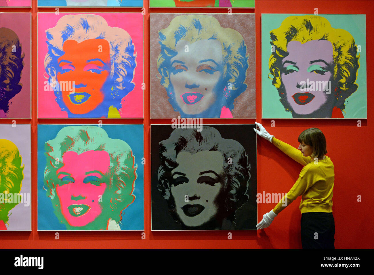 Catherine Daunt, project curator at the British Museum, adjusts one of ...